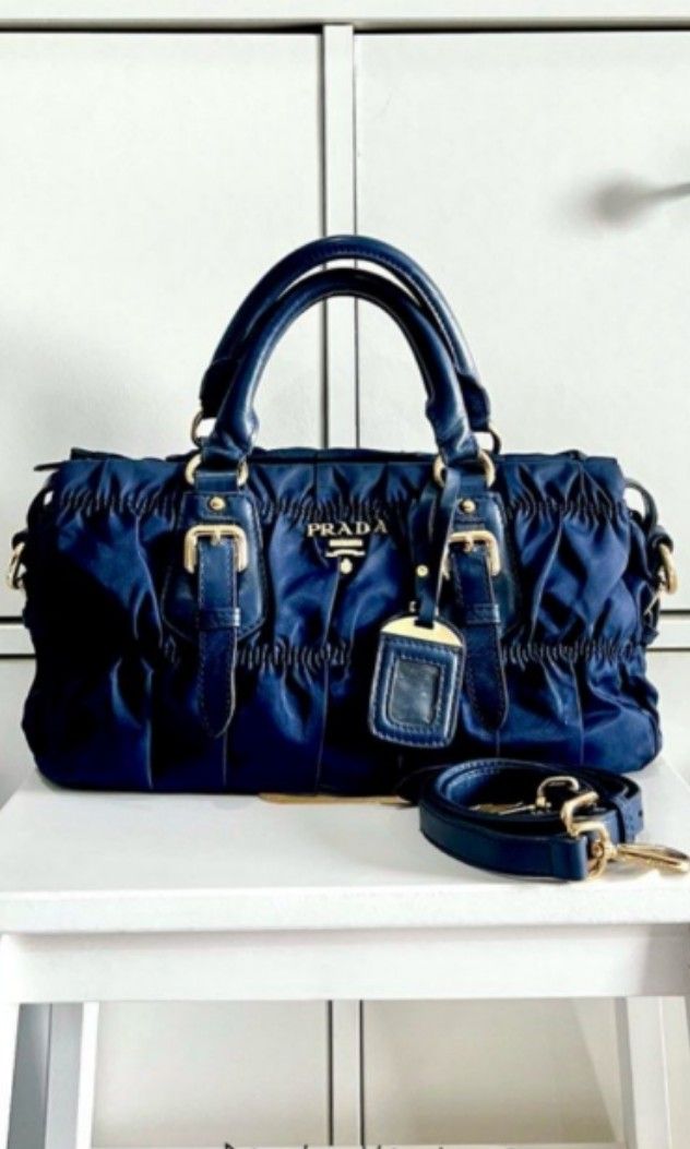 Prada crossbody 2 way bag, Luxury, Bags & Wallets on Carousell