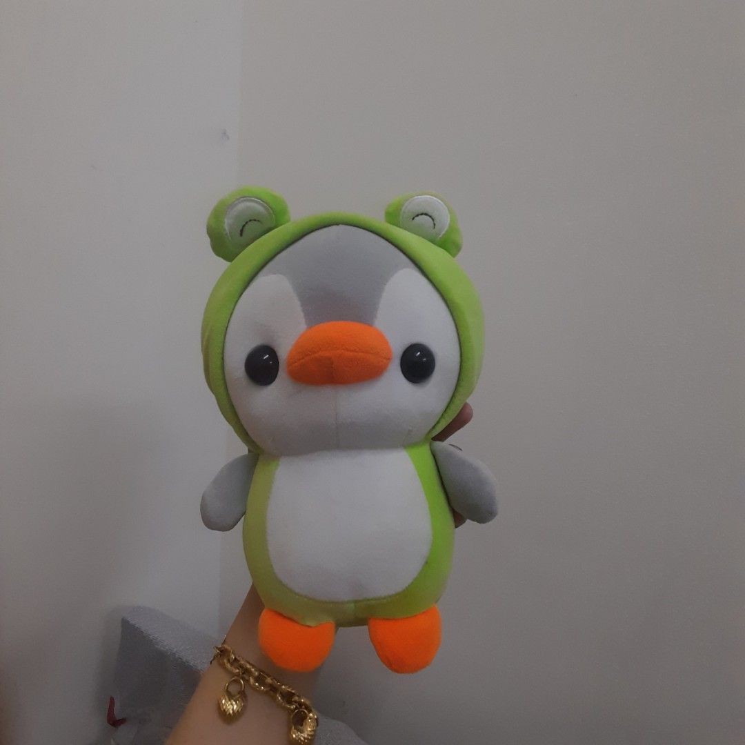 Penguin in frog custome, Hobbies & Toys, Toys & Games on Carousell