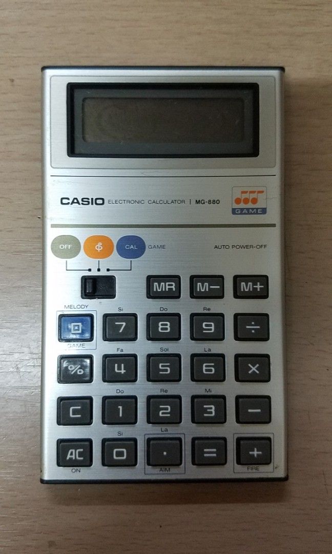 (SOLD 巳售) 上世紀七、八十年代流行一時 CASIO MG-880 遊戲 計數機 ( 請細看相片，計算機屏幕老化變黑，但運作及顯示均正常，介意勿買) (see settlement ...