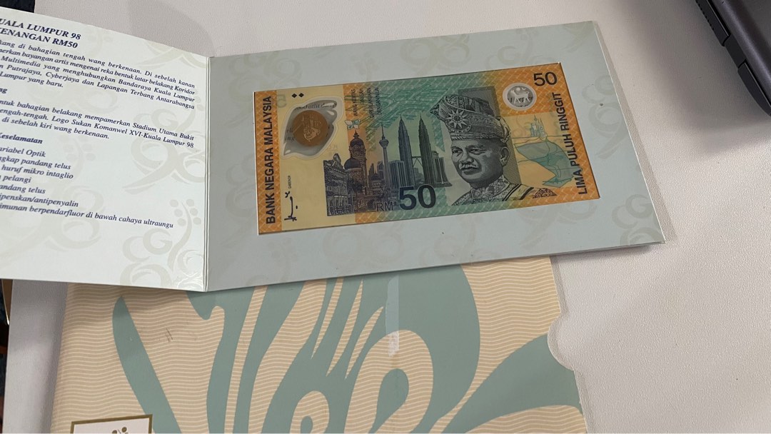Sukom Rm50 with folder, Hobbies & Toys, Collectibles & Memorabilia, Currency on Carousell