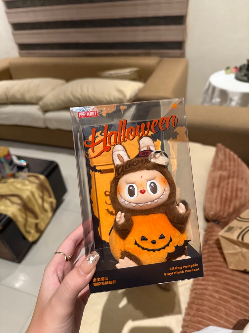Halloween labubu seating pumpkin, Hobbies & Toys, Toys & Games on Carousell