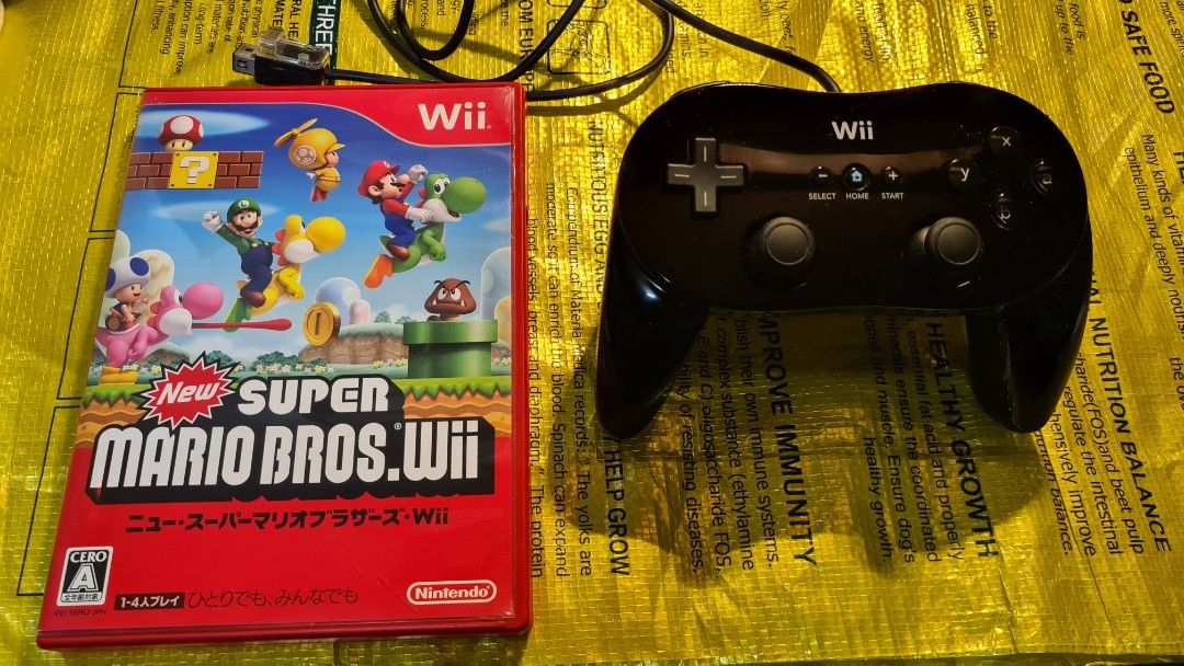 SALE ‼️Nintendo Bundle : New SMB Wii & Pro Controller Classic black ...