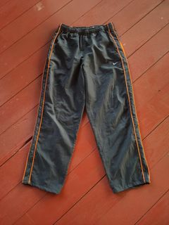 NIKE SIDE BUTTON TRACKPANTS, Men's Fashion, Bottoms, Joggers on Carousell