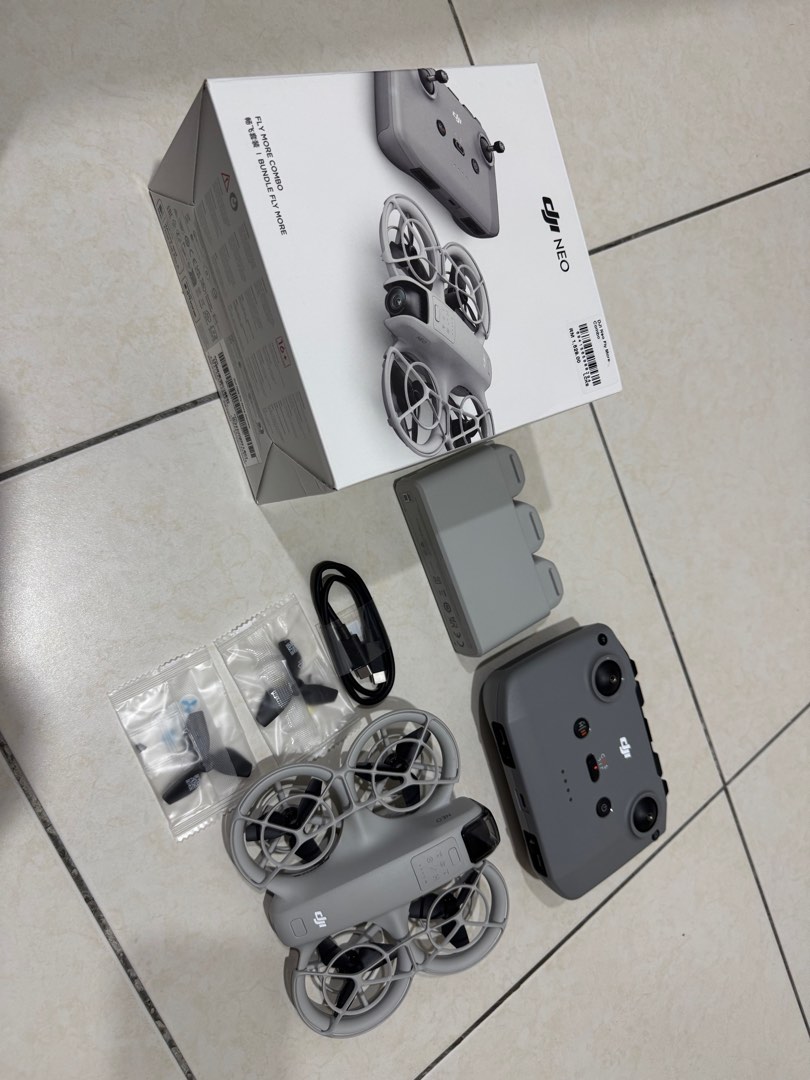 DJI Neo Drone Combo, Photography, Drones on Carousell