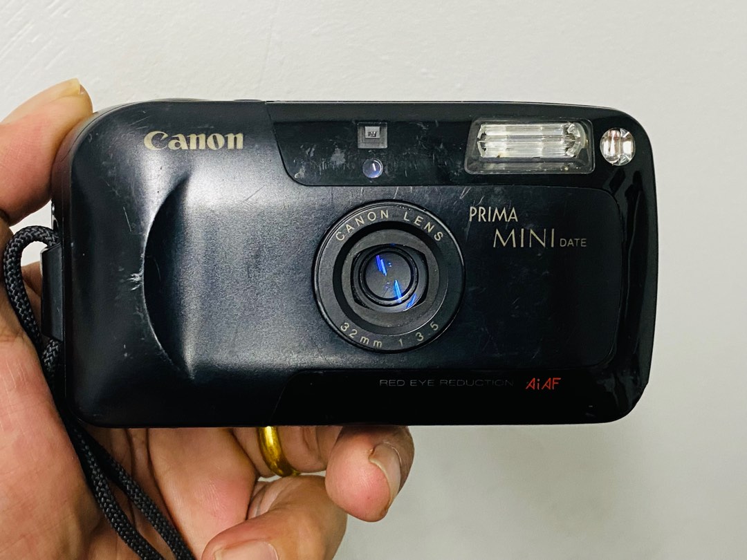 Canon prima mini date film camera, Photography, Cameras on Carousell