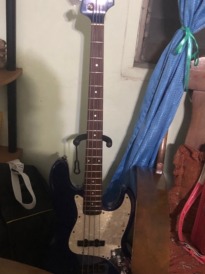 Navy bass guitar, Hobbies & Toys, Music & Media, CDs & DVDs on Carousell