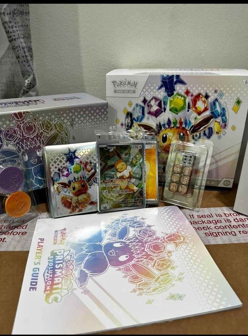 Prismatic Evolution ETB Box and accessories, Hobbies & Toys ...