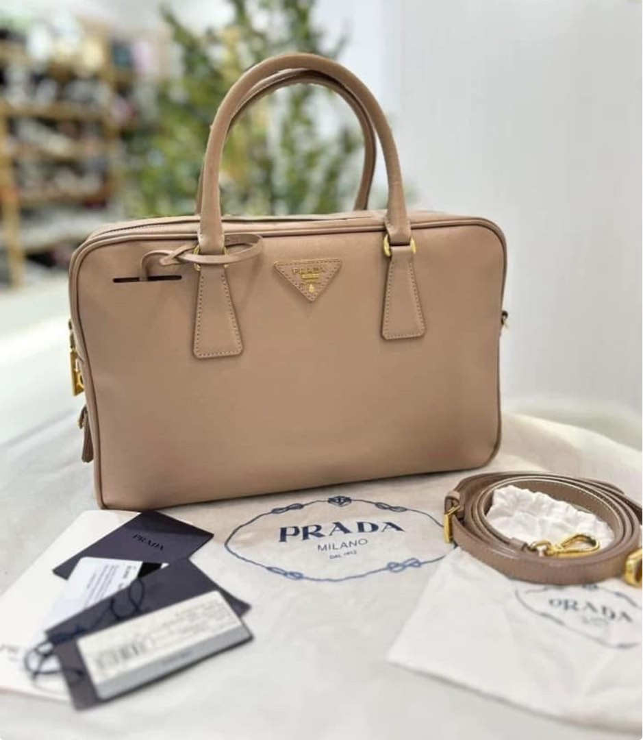 Prada fits laptop, Luxury, Bags & Wallets on Carousell