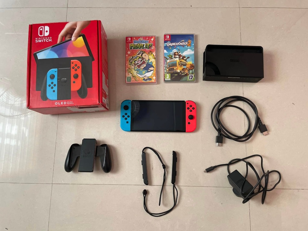 Nintendo Switch OLED Neon Blue/Neon Red, Video Gaming, Video Game Consoles, Nintendo on Carousell