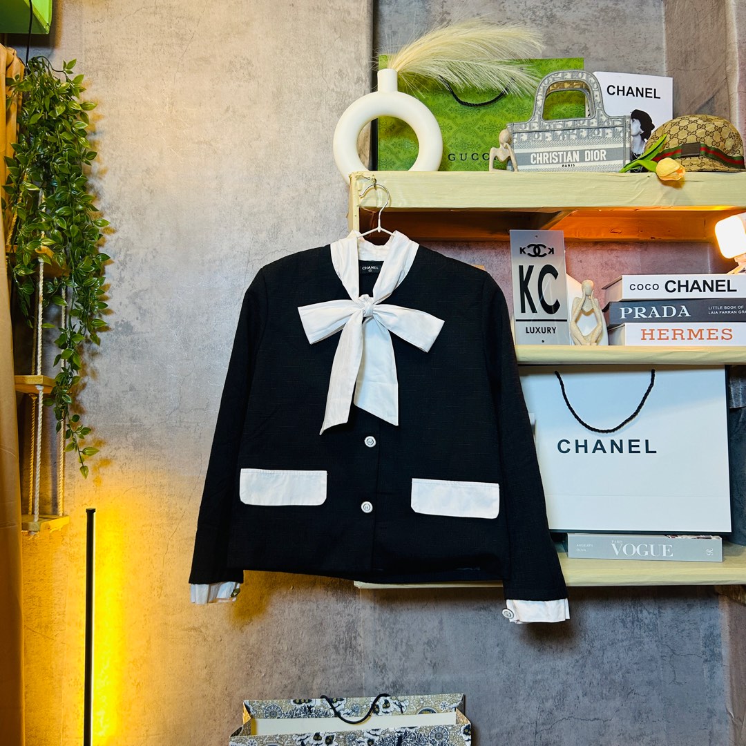 Chanel bow top, Luxury, Apparel on Carousell