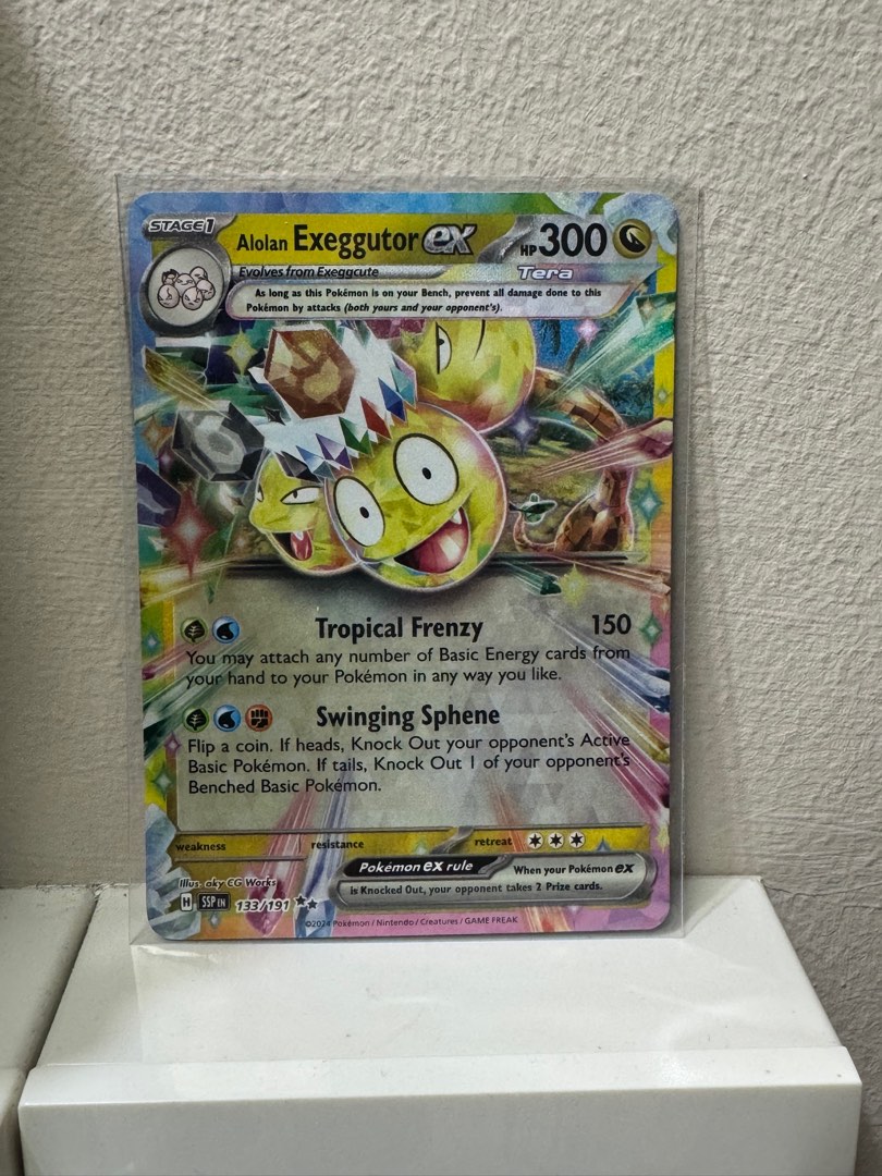 Alolan Exeggutor EX Surging Sparks, Hobbies & Toys, Toys & Games on ...