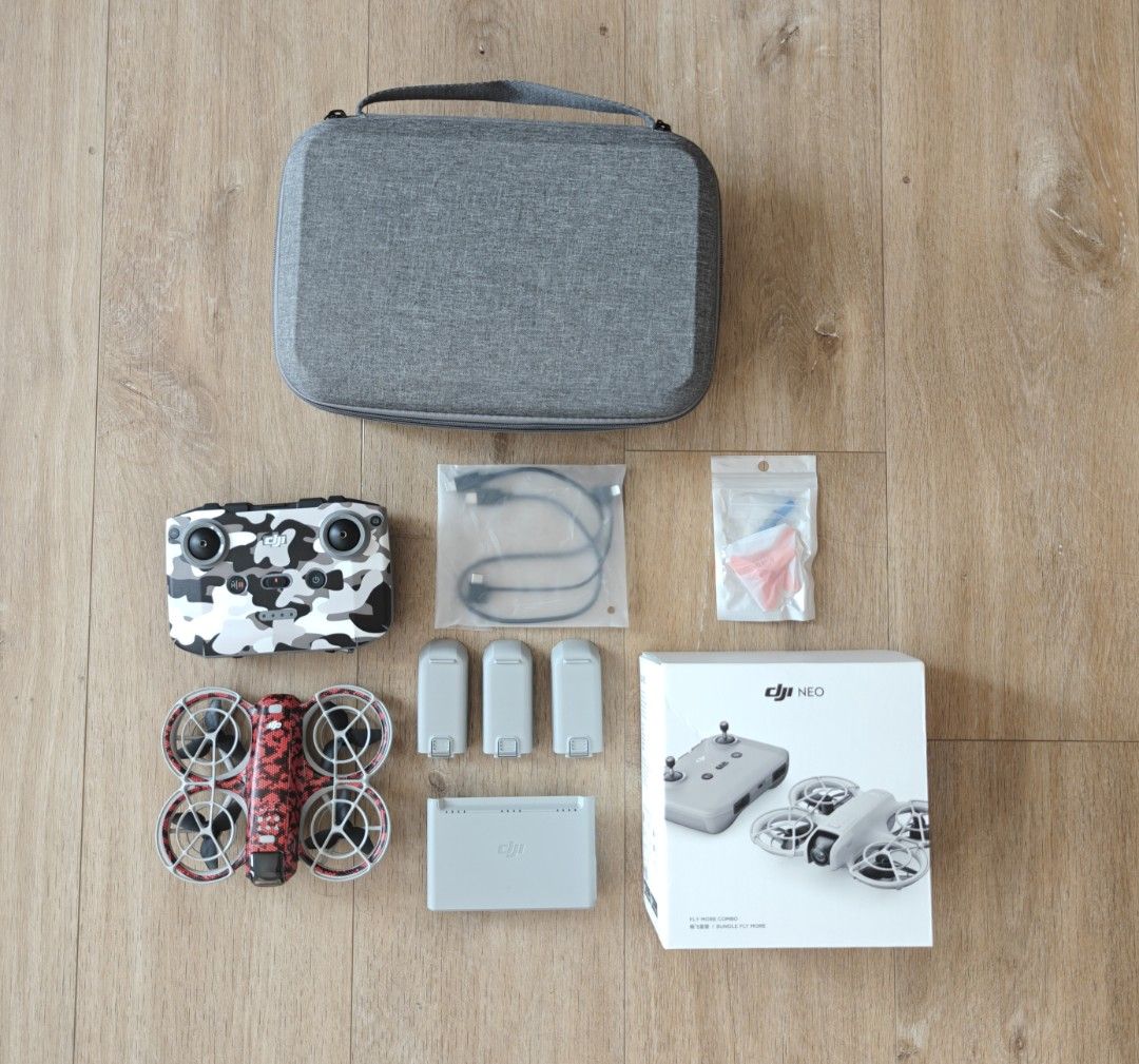 DJI NEO Fly More Combo with original box, Photography, Drones on Carousell