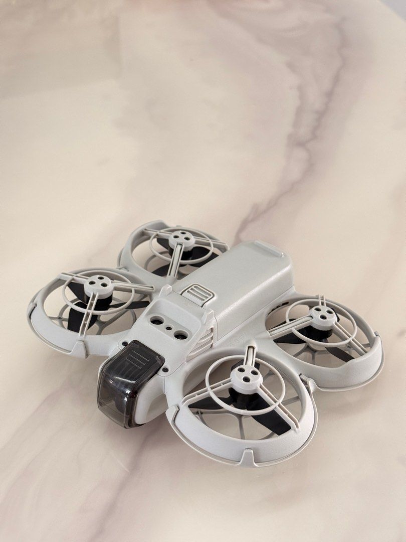 DJI Neo, Photography, Drones on Carousell