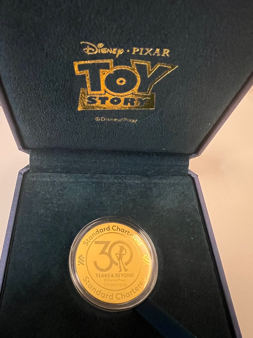 Standard Chartered Toy Story 30th Anniversary Coin, 興趣及遊戲, 玩具 & 遊戲類 ...