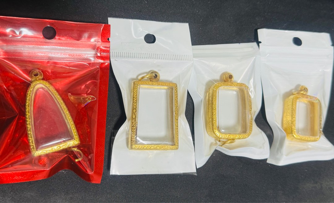 Laser Gold amulet casings, Hobbies & Toys, Religious Items on Carousell