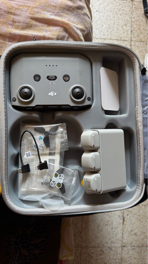 DJI NEO Battery & remote control, Photography, Drones on Carousell