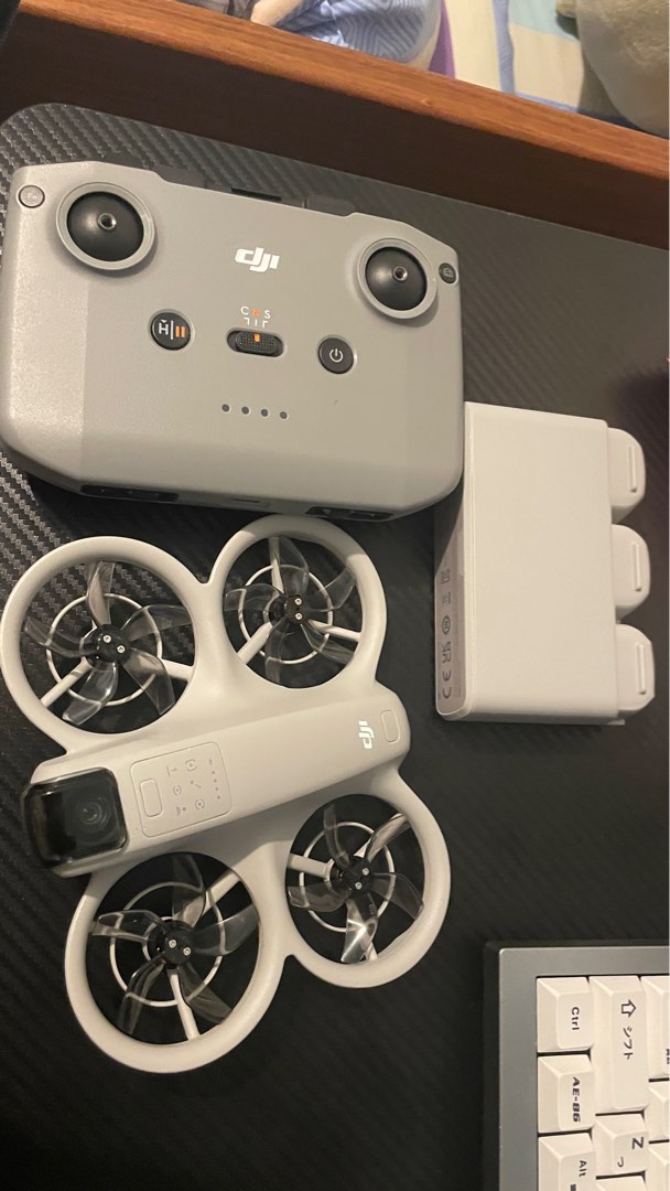 DJI Neo Drone Combo, Photography, Drones on Carousell