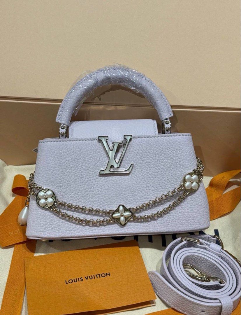 Louis vuitton capucines east west lilac MOP chain, Luxury, Bags ...