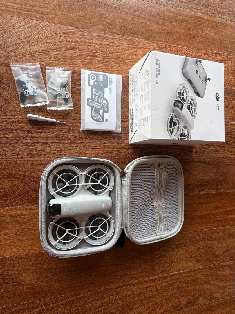 DJI Neo - with extra battery and case, Photography, Drones on Carousell