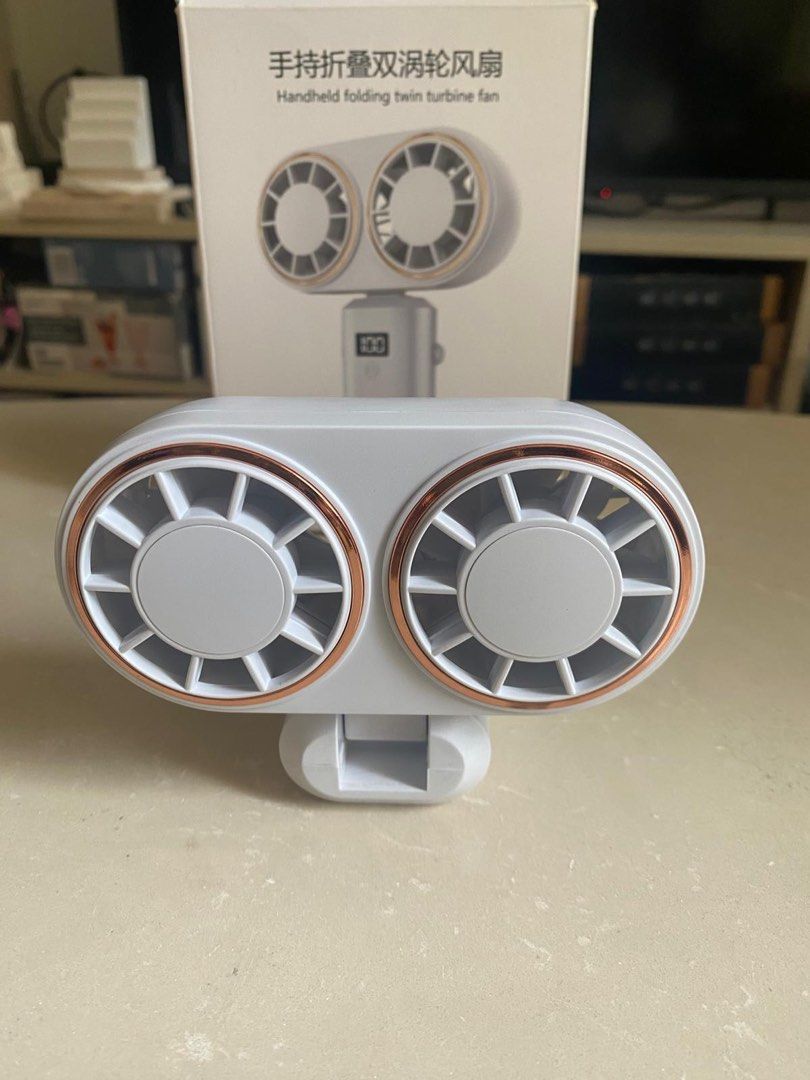 Handheld folding twin turbine fan, 家庭電器, 其他家庭電器 - Carousell