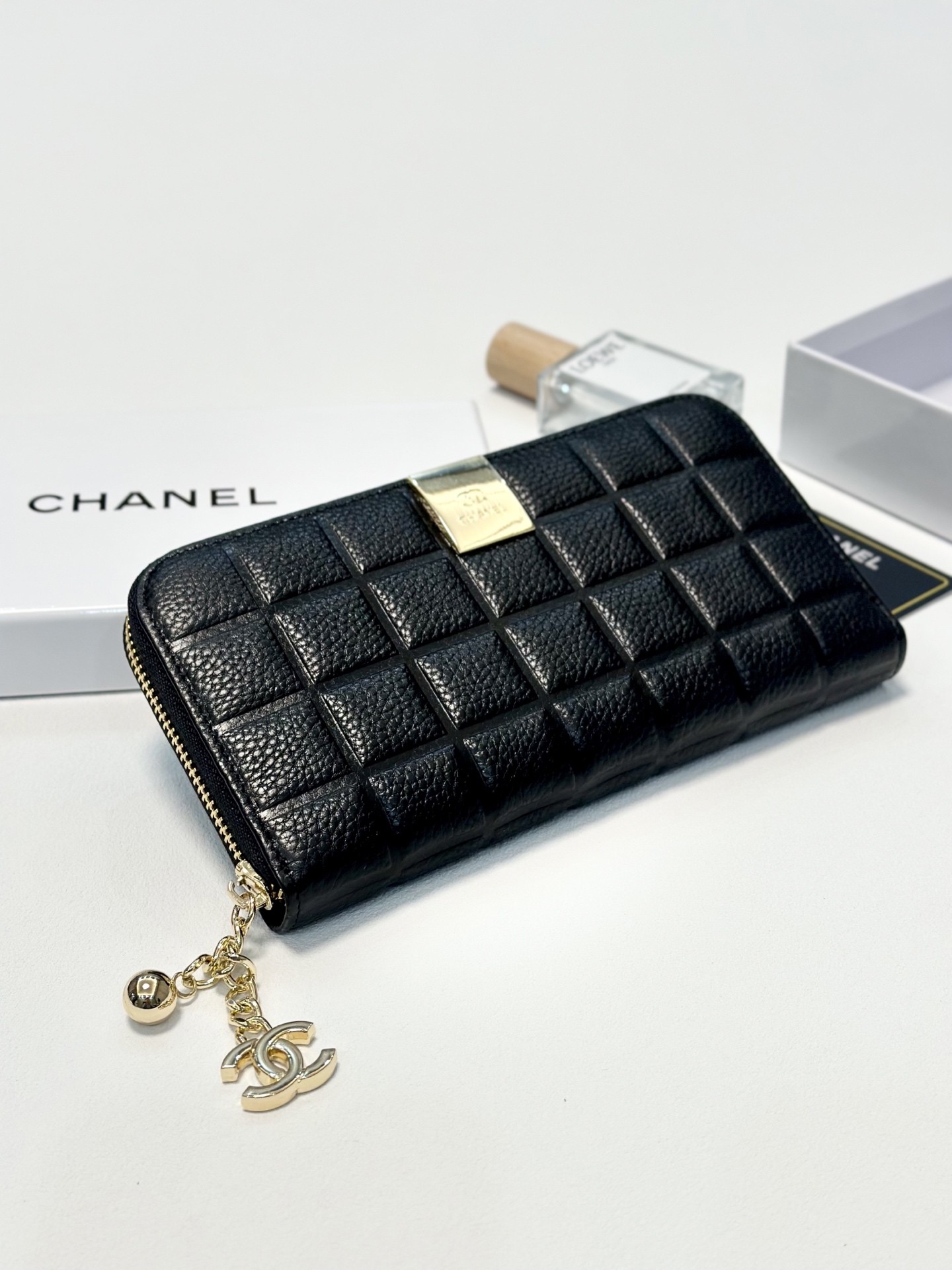 Chanel black long wallet with classic check pattern and gold CC pendant ...
