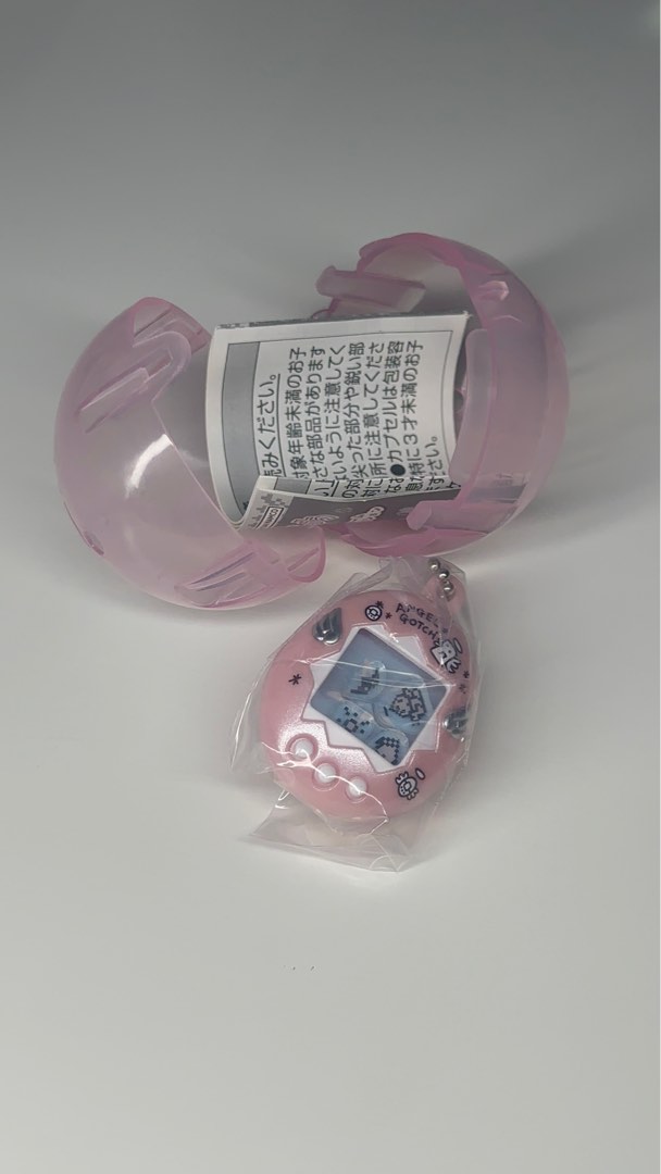 angel gotch gashapon pink tamagotchi, Hobbies & Toys, Toys & Games on ...