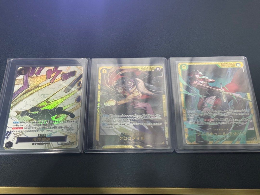 Op14 mihawk manga & sec crocodile sec & event card, Hobbies & Toys, Toys & Games on Carousell