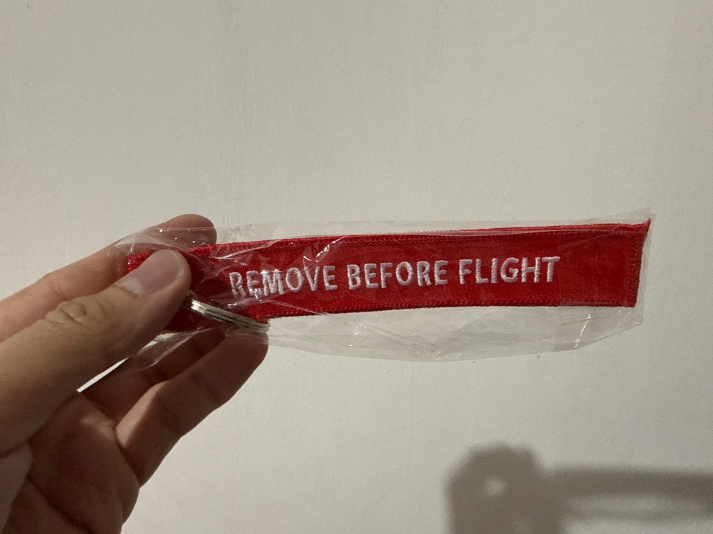Remove before flight key chain, Everything Else on Carousell
