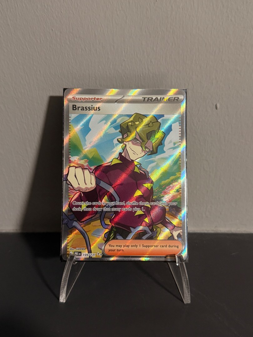 $0.50 Prismatic Evolutions Brassius #135 Full Art, Hobbies & Toys, Toys ...