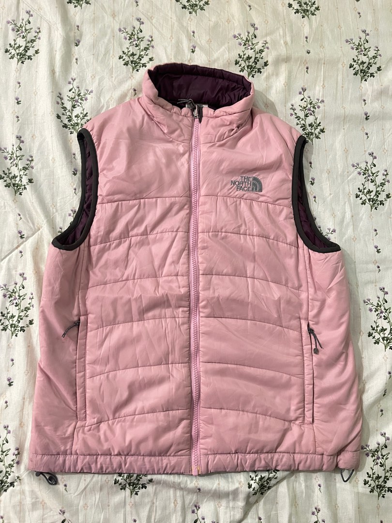 the north face pink puff jacket, Women's Fashion, Tops, Sleeveless on ...