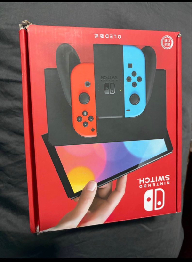 Nintendo Switch OLED - Red/Blue Joy-Con, Video Gaming, Video Game ...