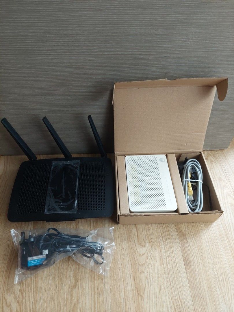 Linksys Router with Accessories & Huawei Optical Network Terminal ...