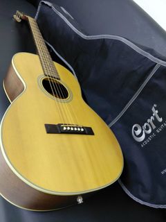 Cort luce solid top parlor guitar with slotted headstock and installed ...