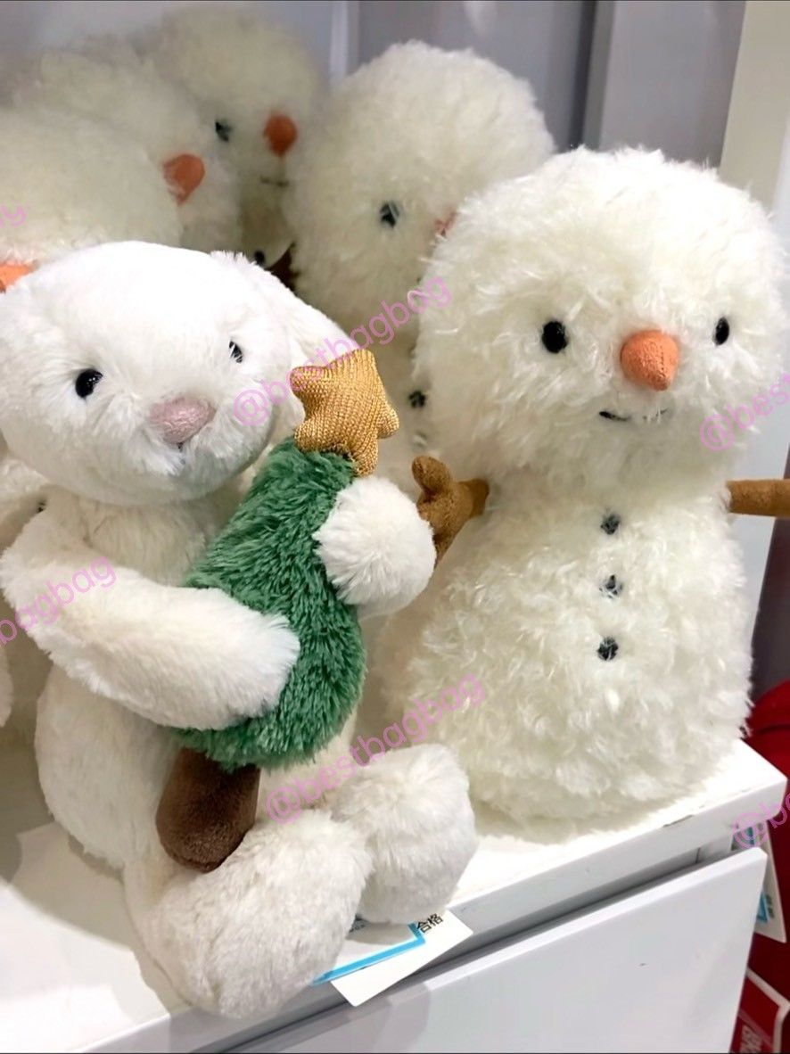 Jellycat's new British Bonnie Rabbit plush toy embracing a Christmas ...