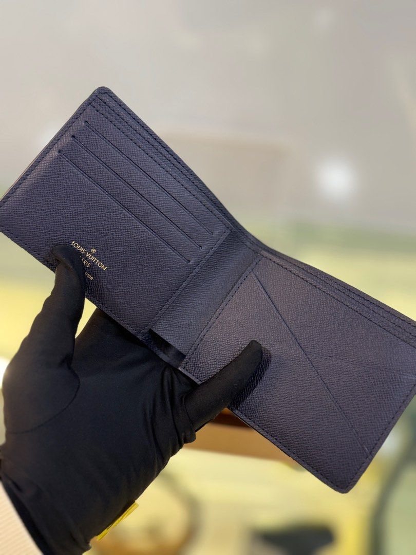 💯 Louis Vuitton Multiple Wallet in the Monogram Bleach coated canvas ...