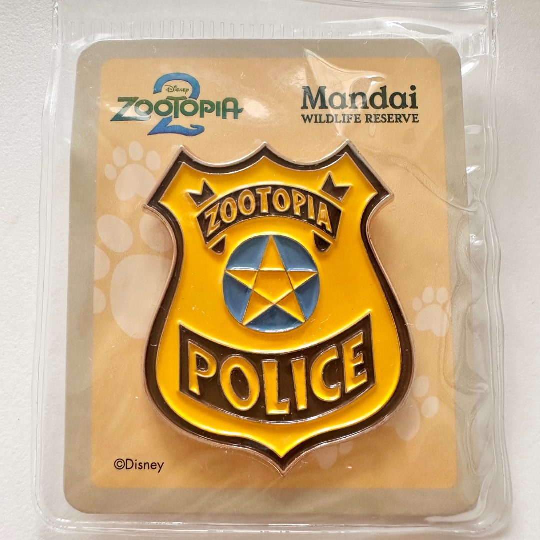 BN Zootopia police badge pin (from Mandai Wildlife Reserve), Hobbies ...