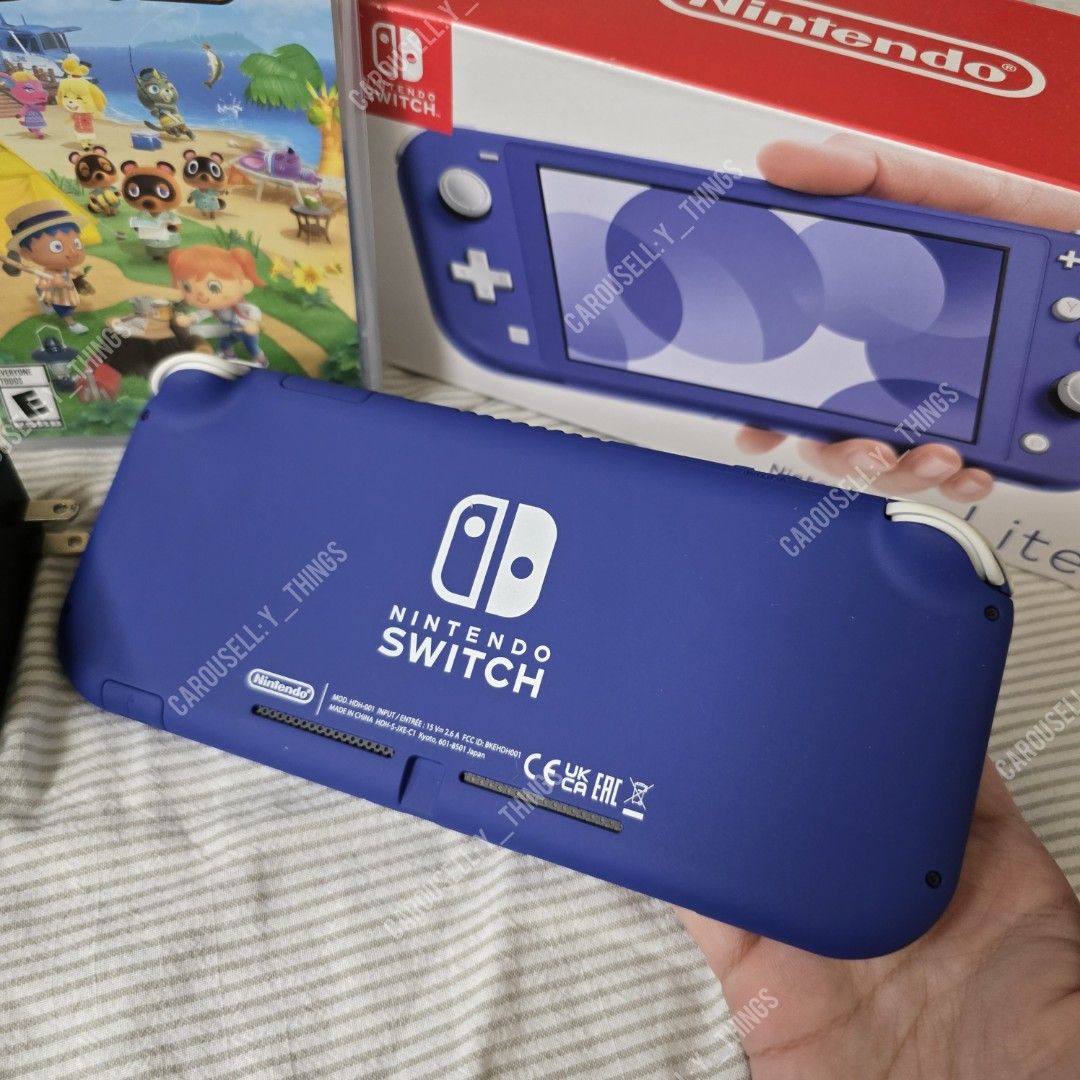 Nintendo Switch Lite in Blue with Animal Crossing Game and Hello Kitty ...