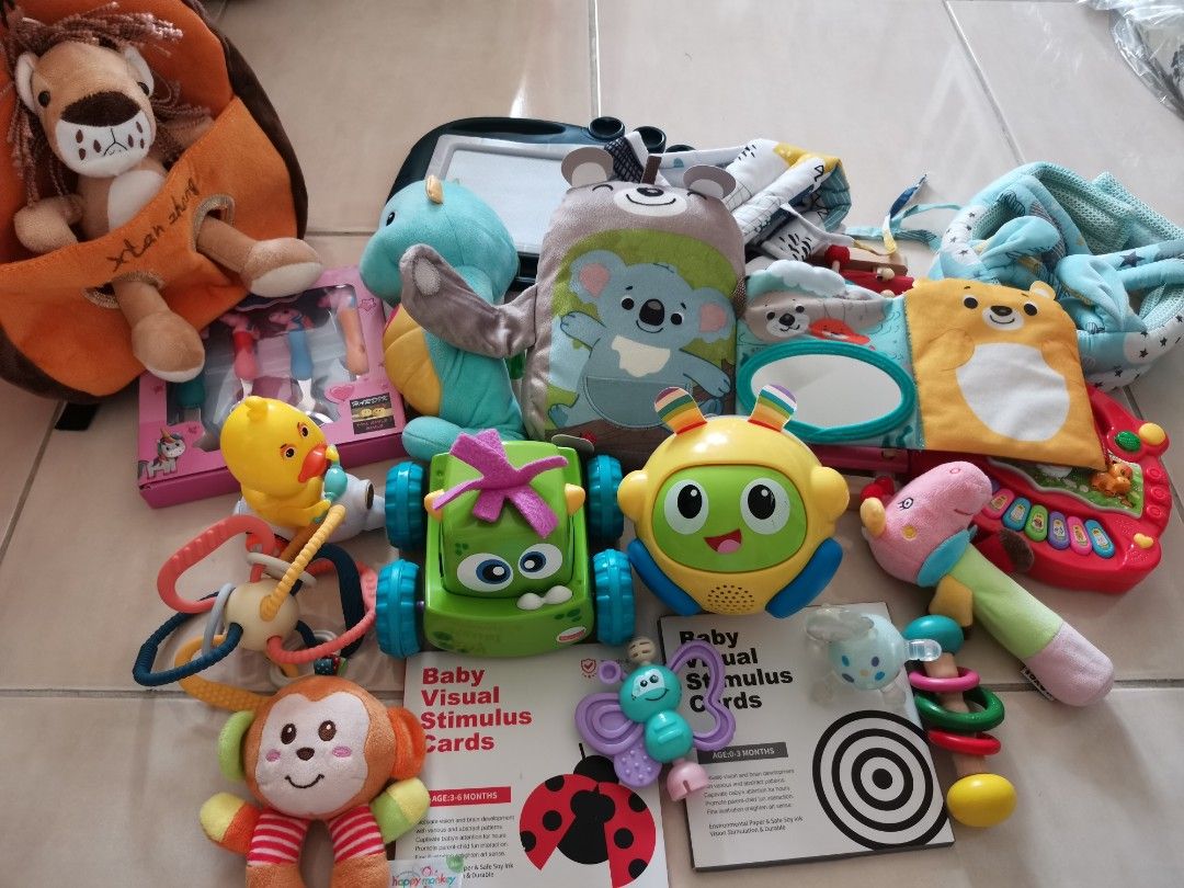 Original Fisher price toys, rattle and teether, book and bag etc ...