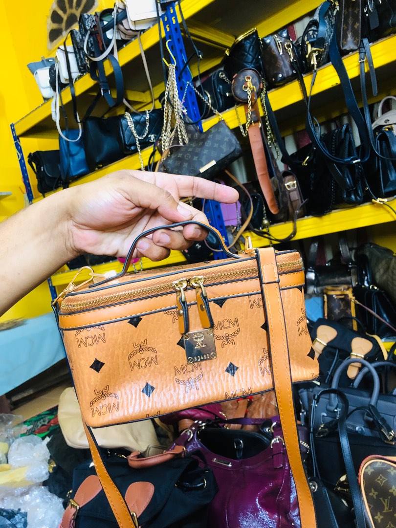 sling mcm box, Luxury, Bags & Wallets on Carousell