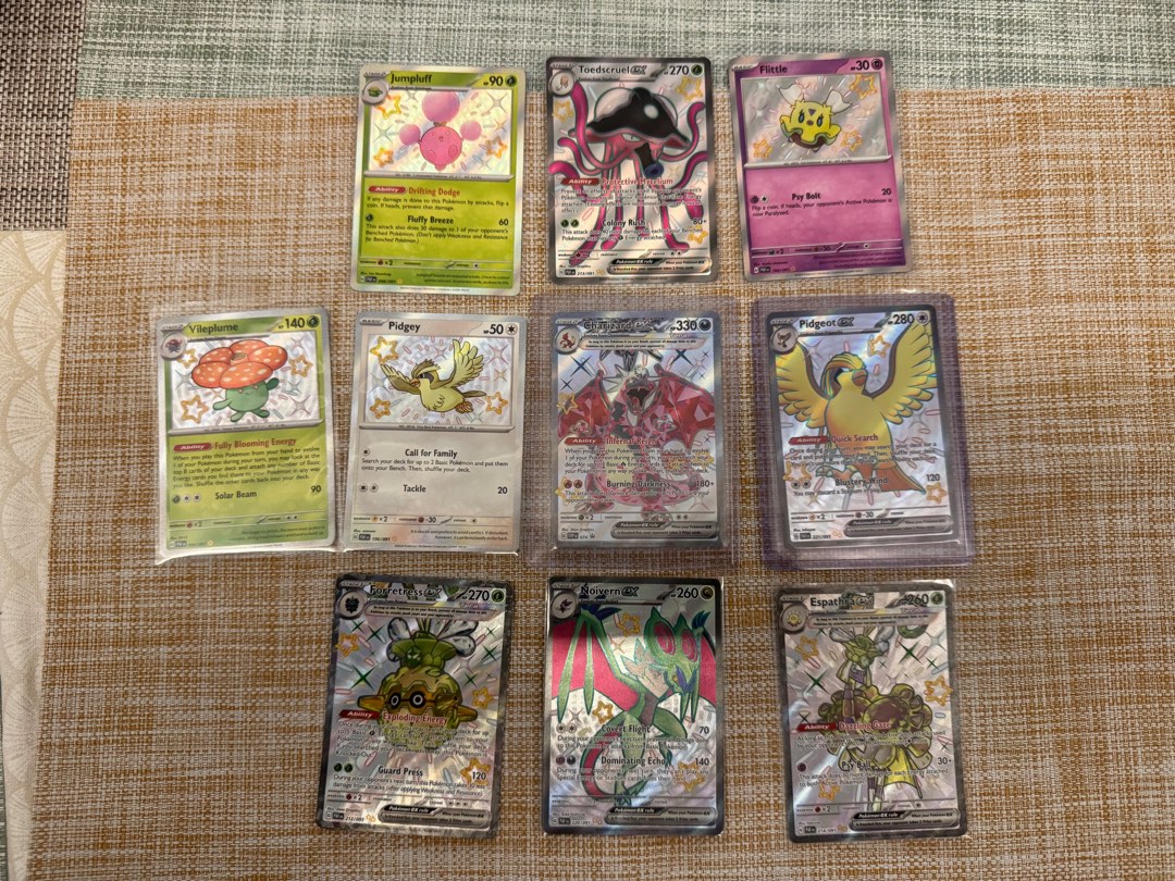 Pokemon cards Paldean Fates hits trainers baby shinies Charizard ...