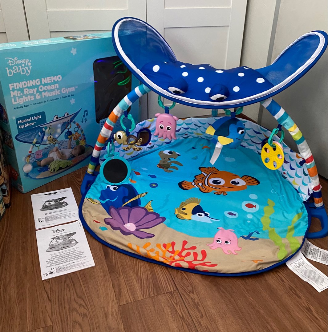 Bright starts disney baby finding nemo mr. Ray ocean lights & music gym ...