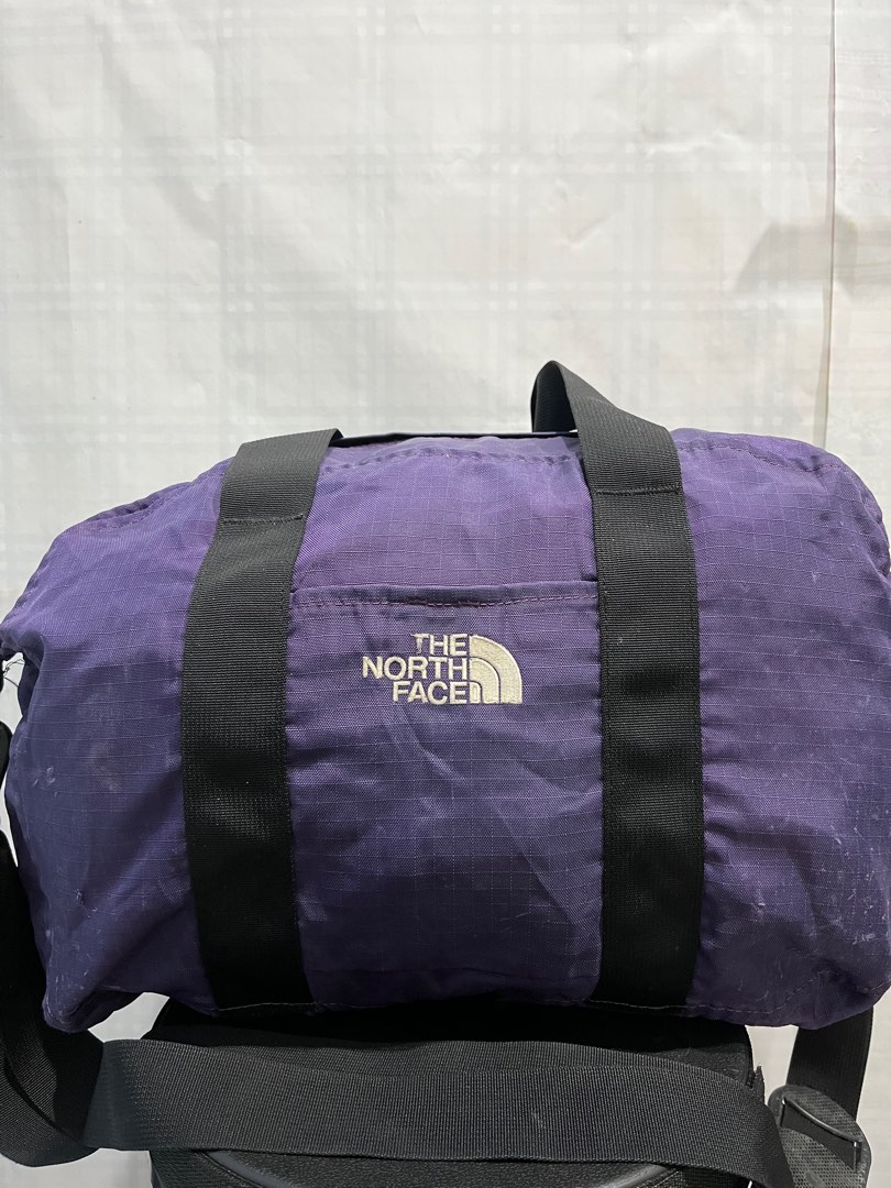 The North face ( TNF ) duffle bag, Barang Mewah, Tas & Dompet di Carousell