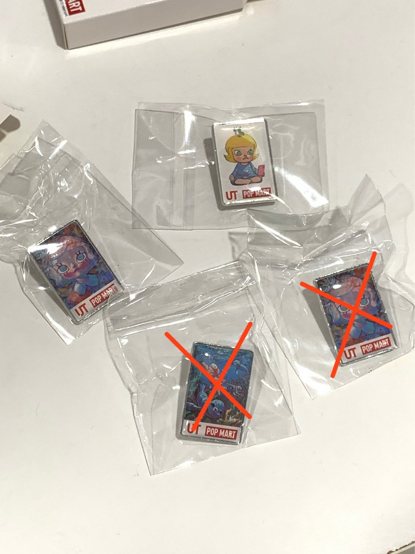 Uniqlo Molly pin, Hobbies & Toys, Toys & Games on Carousell