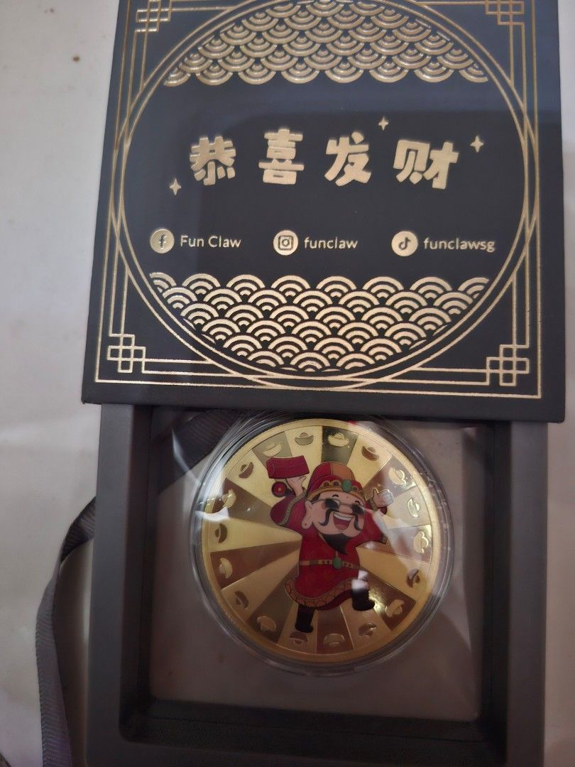 Fun claw cai shen ye gold coin, Everything Else on Carousell