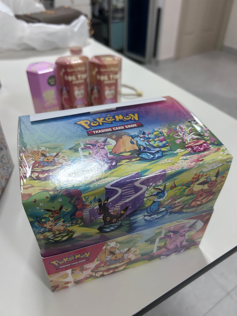 prismatic evolution tins, Hobbies & Toys, Toys & Games on Carousell