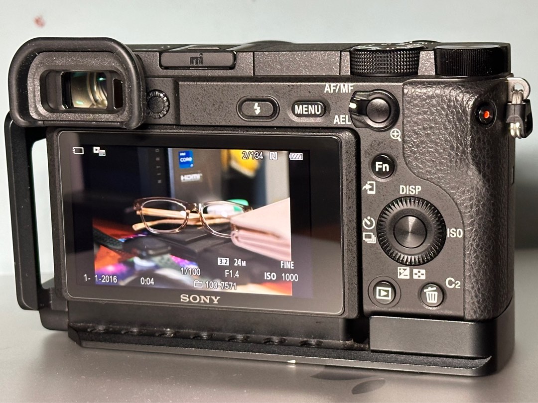Sony a6400 with 16-50 and Base grip, Photography, Cameras on Carousell