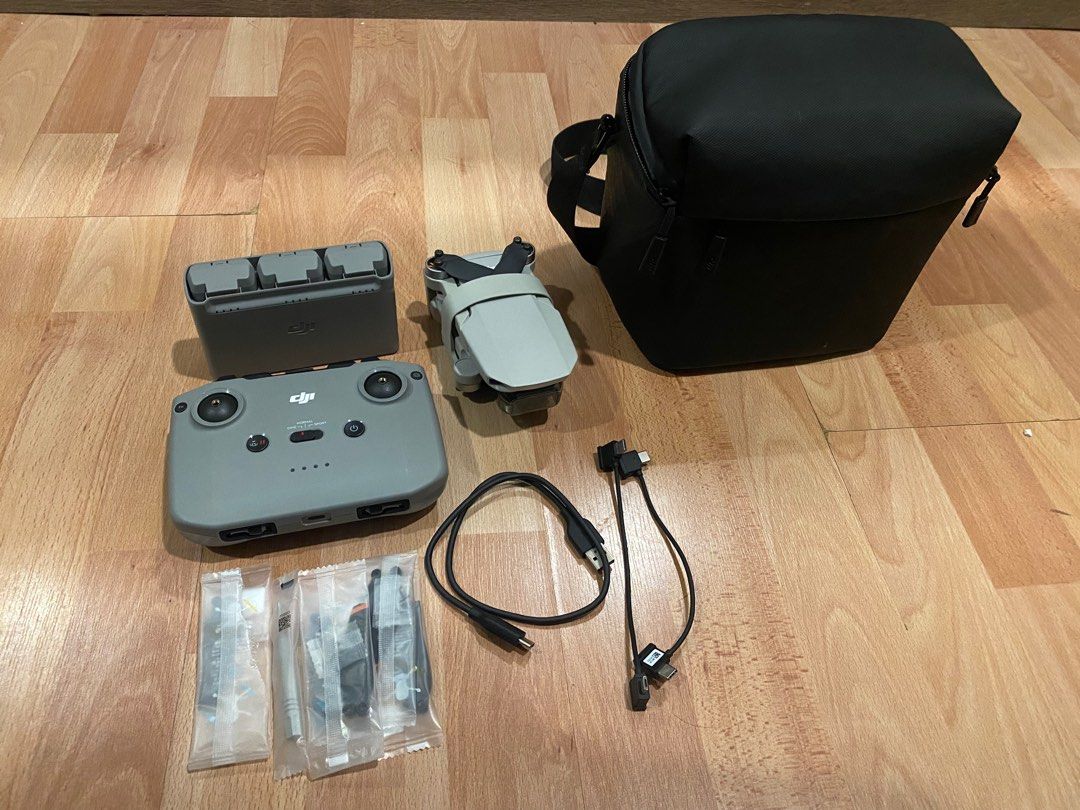 Used DJI MINI 2 se fly more combo, Photography, Drones on Carousell