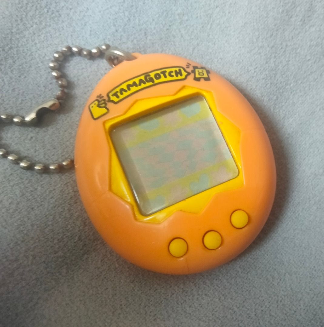 SOLD AS IS. Bandai 1996 First Generation Tamagotchi Orange Japan ...