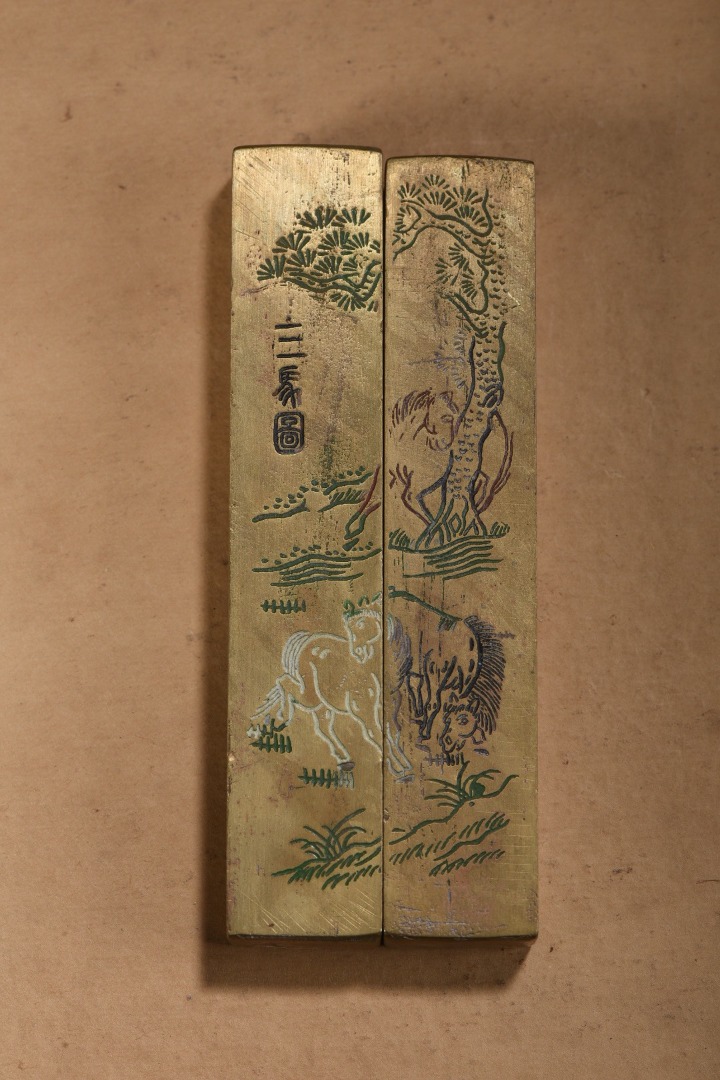 A pair of bronze rulers with three horses carved and painted in old ...