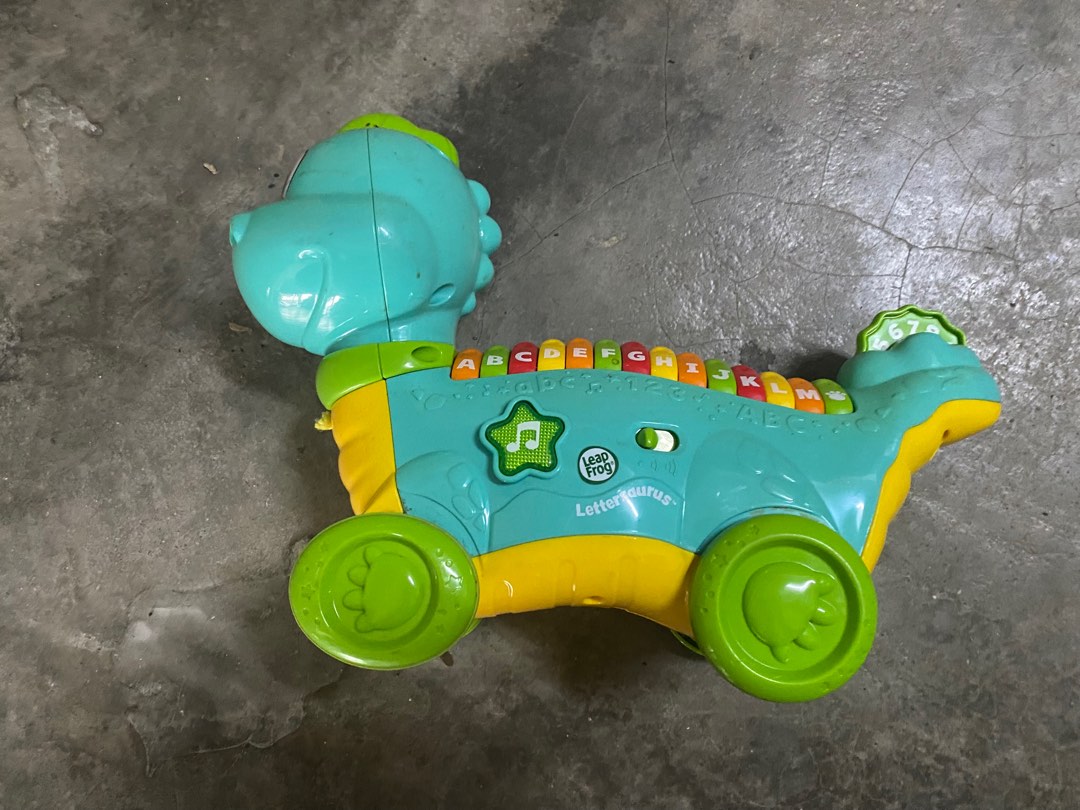 LeapFrog Lettersaurus, an interactive toy designed for children 12 ...